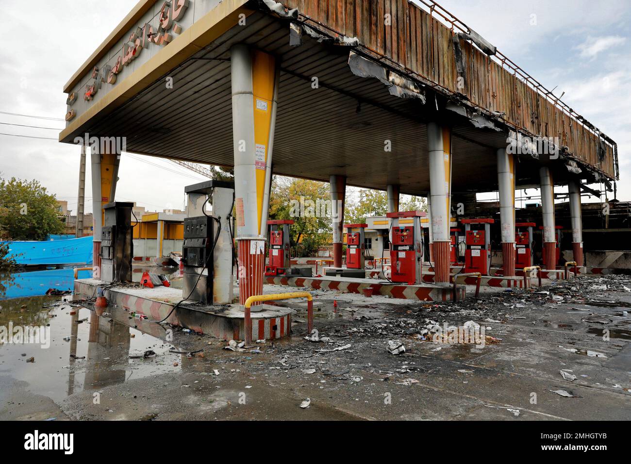 A gas station shows damages after it was attacked and burned during ...