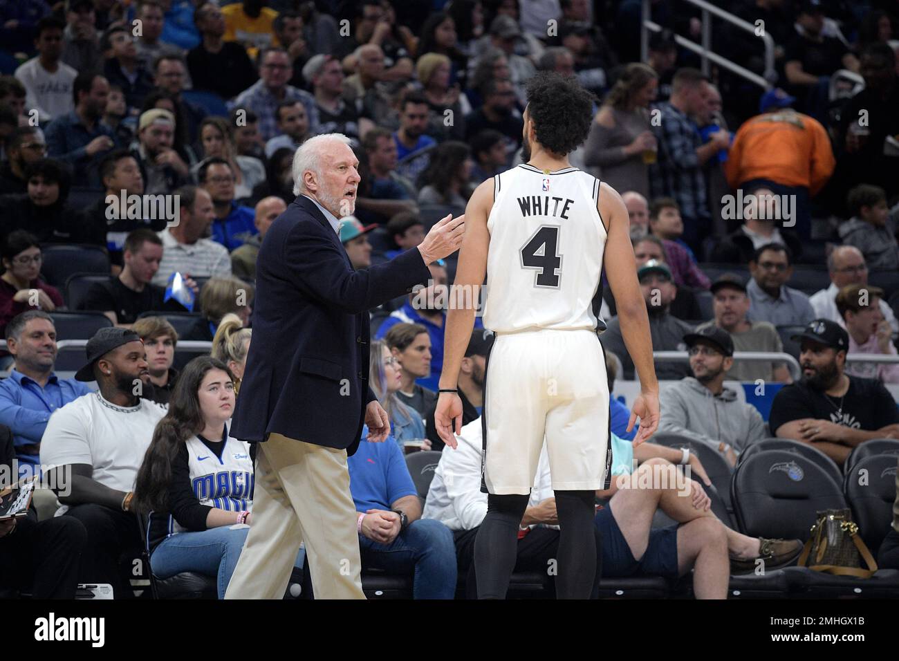 San Antonio Spurs head coach Gregg Popovich, left, talks to guard ...