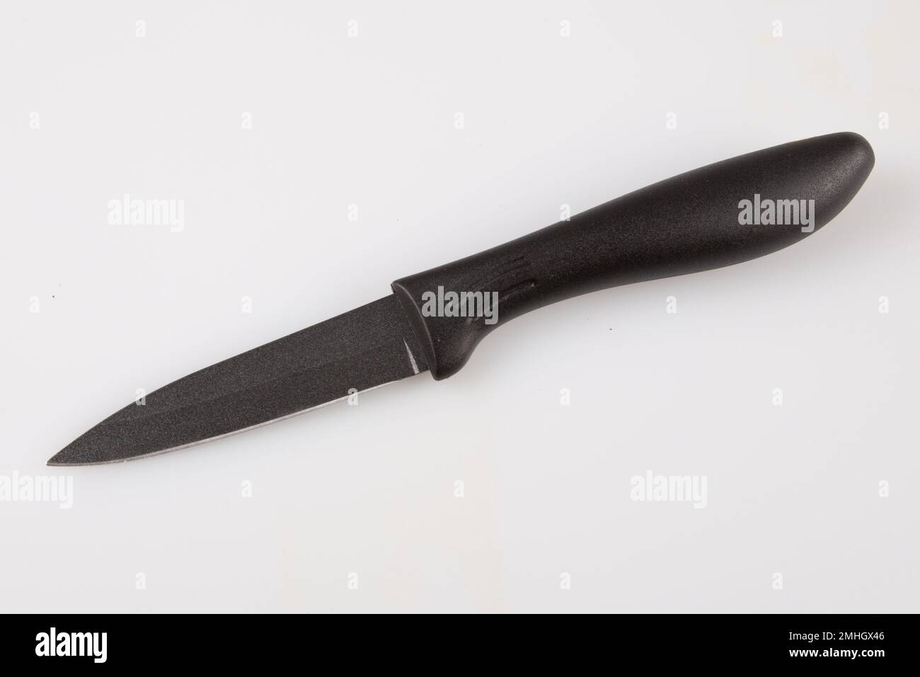 black little office knife isolated on white background Stock Photo - Alamy