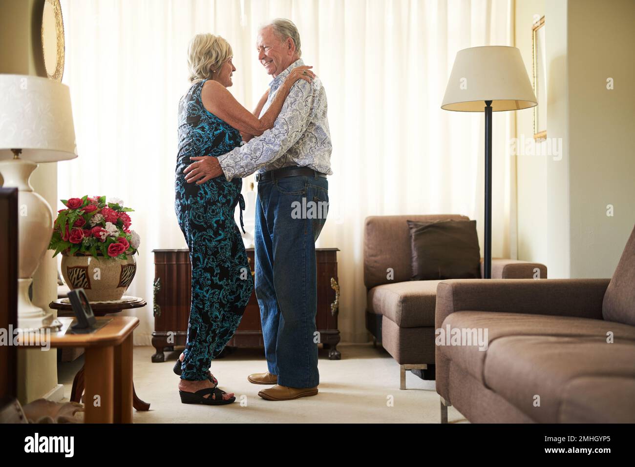The moves that won her heart all those years ago. a happy senior couple ...