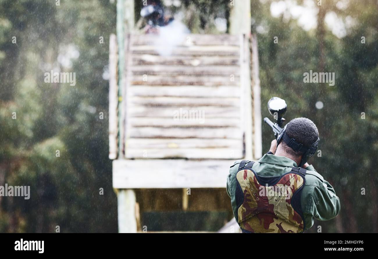 Man shooting target gun hi-res stock photography and images - Alamy