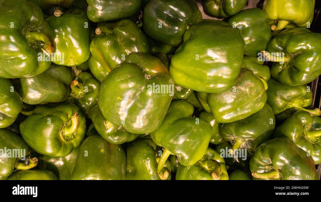 Fresh green natural bell pepper background wallpaper Stock Photo - Alamy