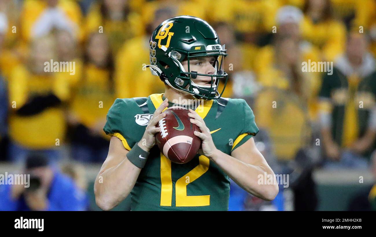 Baylor quarterback Charlie Brewer looks downfield during the first ...