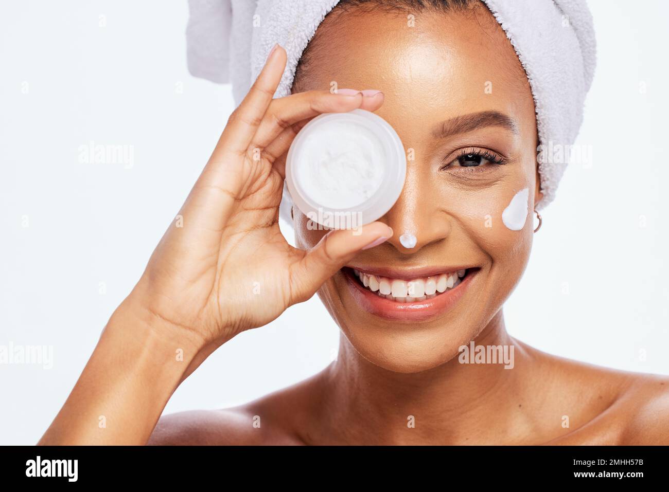 Woman portrait, beauty and cream container for face in studio for ...