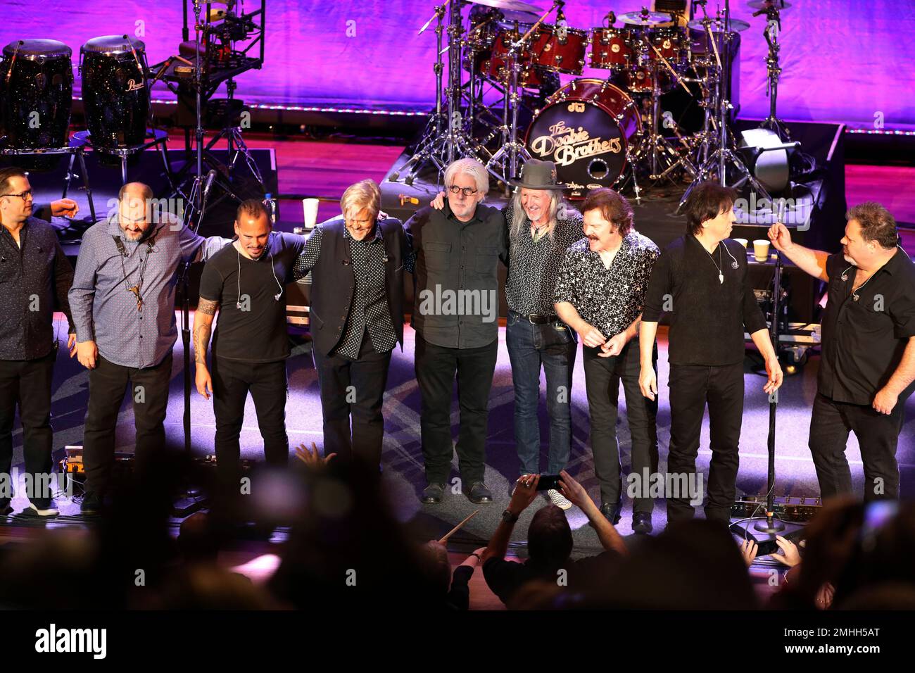 The Doobie Brothers stand on the stage at The Doobie Brothers at Ryman ...