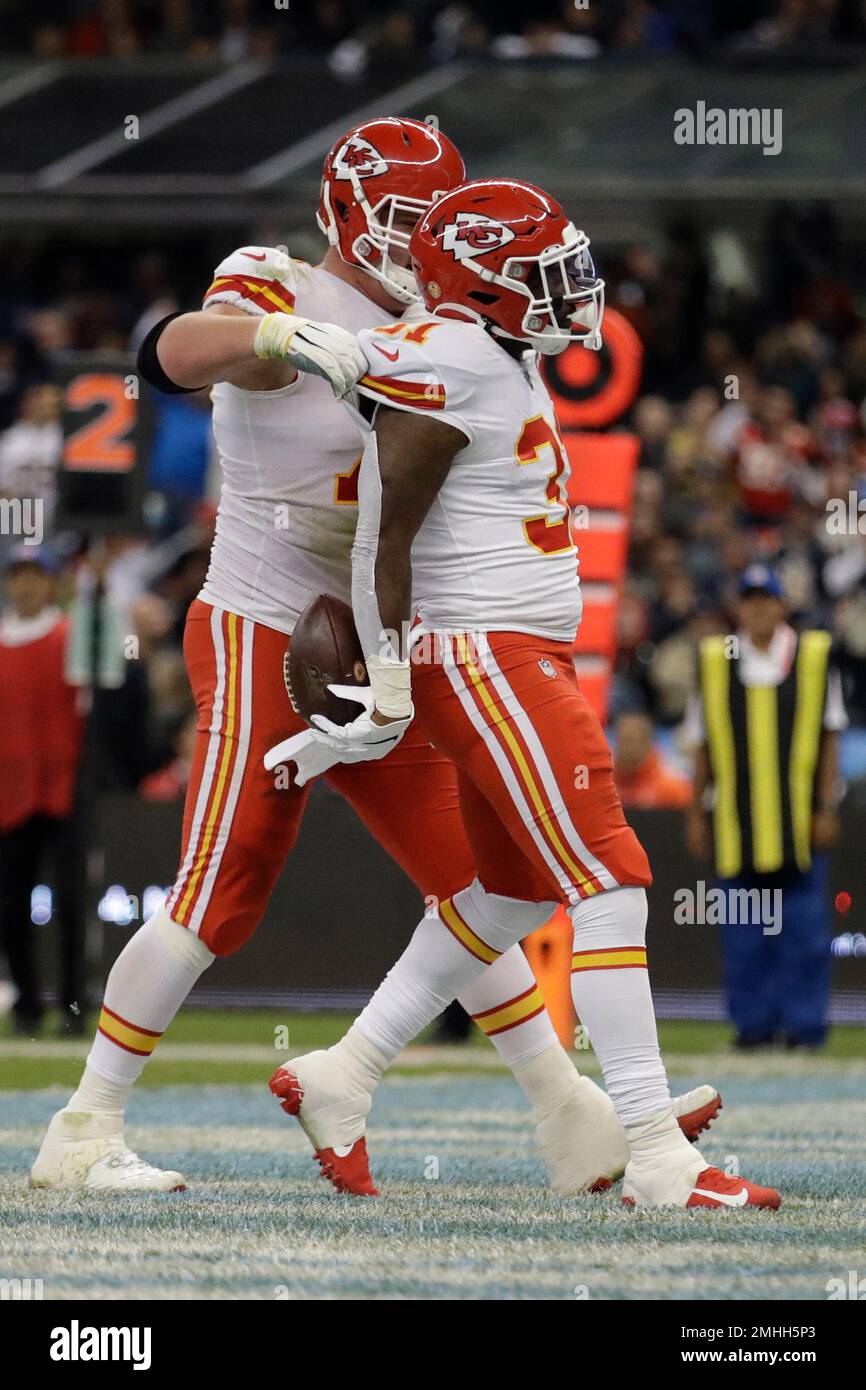 Kansas City Chiefs running back Darrel Williams, right, reacts after ...