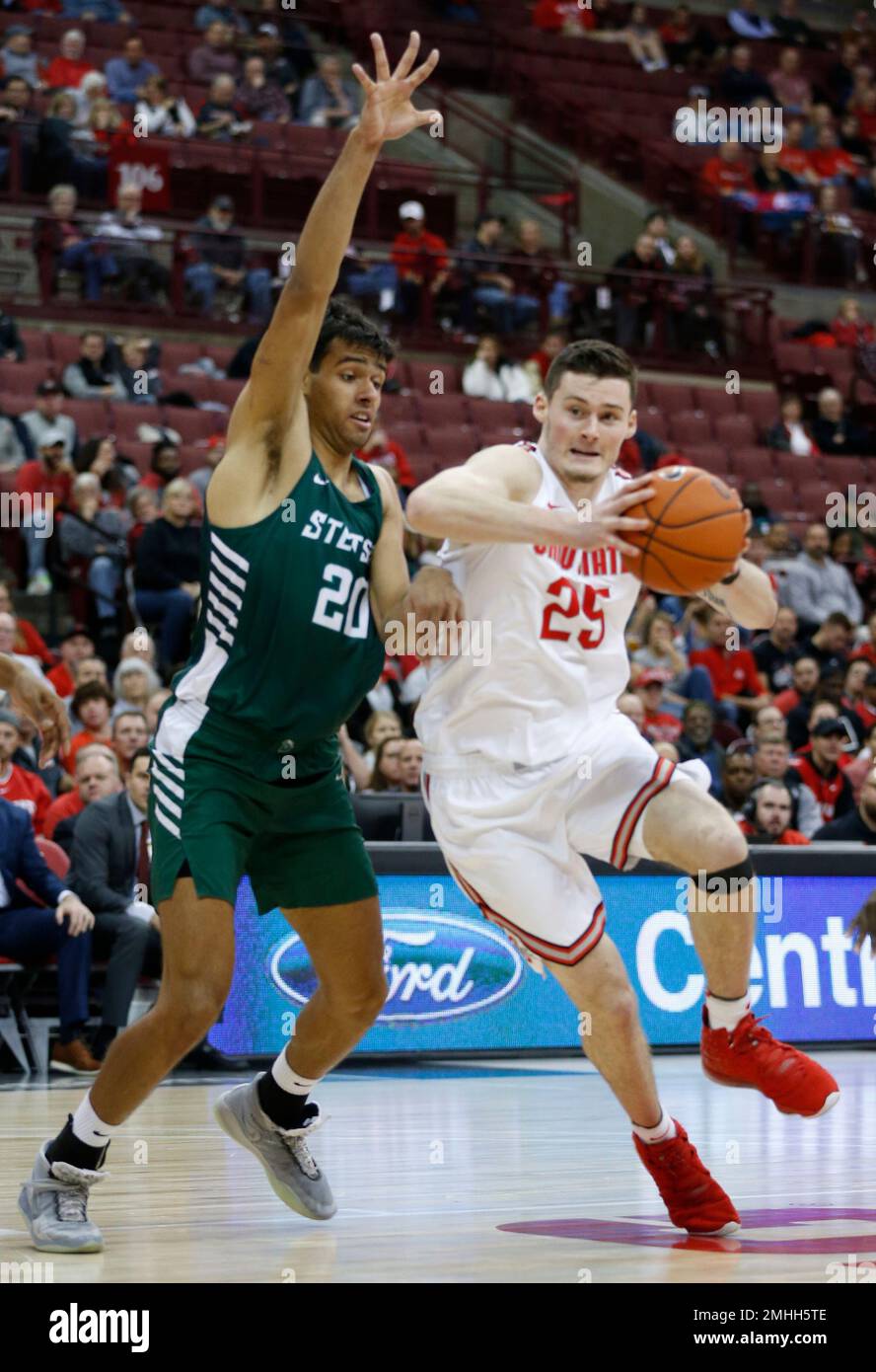 Ohio State's Kyle Young, right, drives to the basket against Stetson's ...