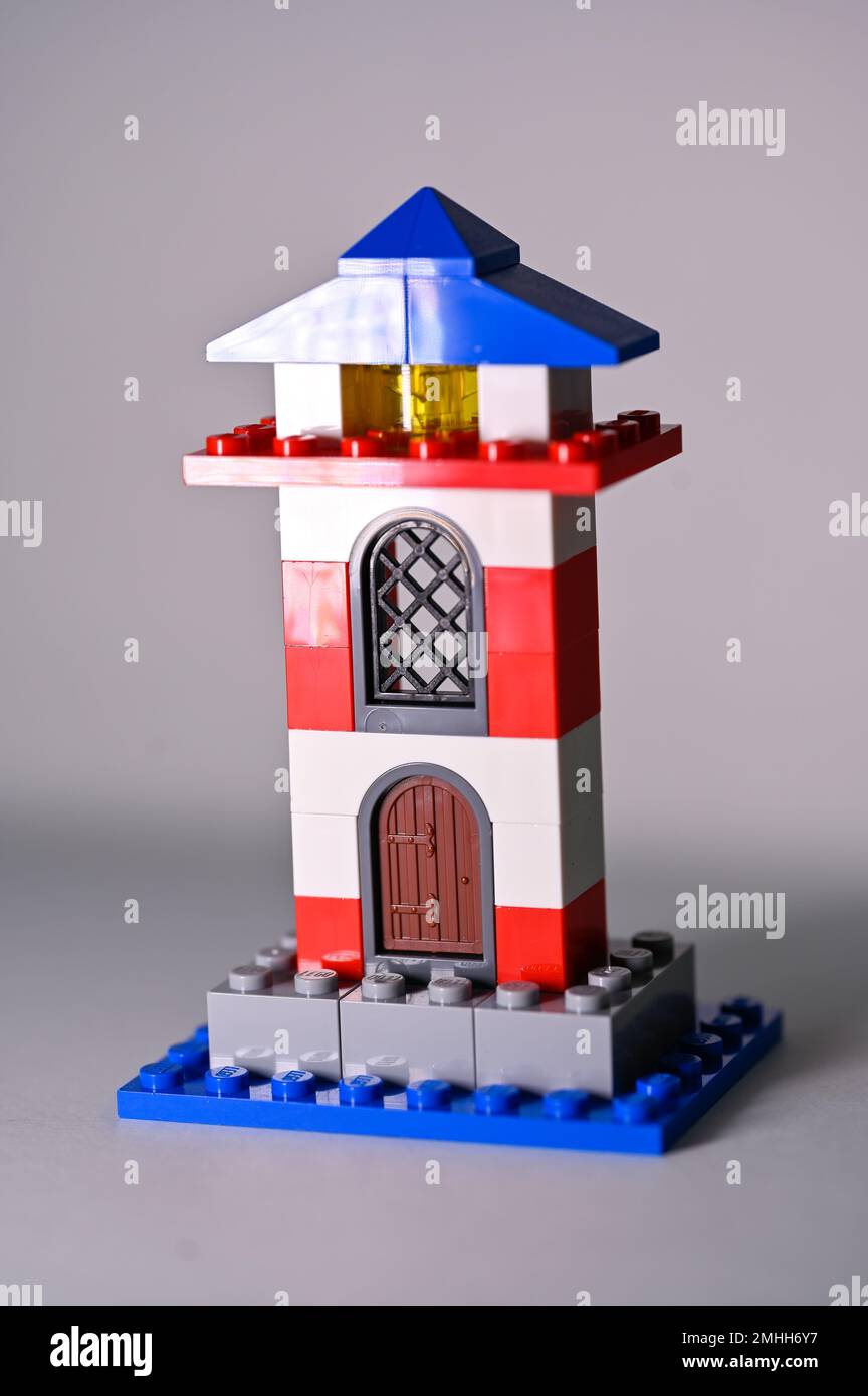 little house built of lego blocks on white table Stock Photo - Alamy