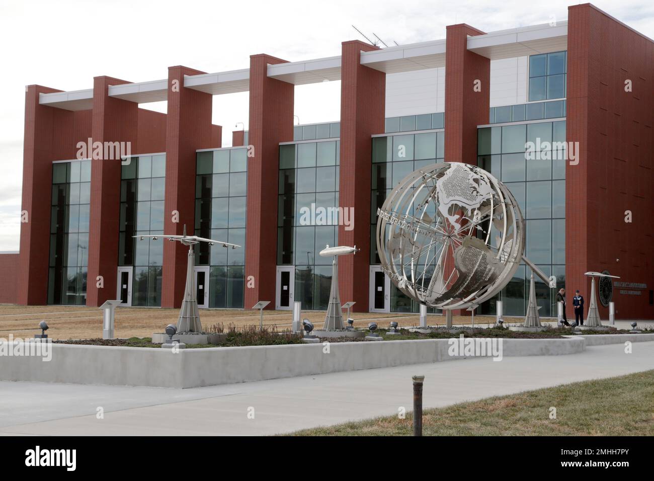 Statues of a bombers and a nuclear submarine stand in front of C2F, US ...