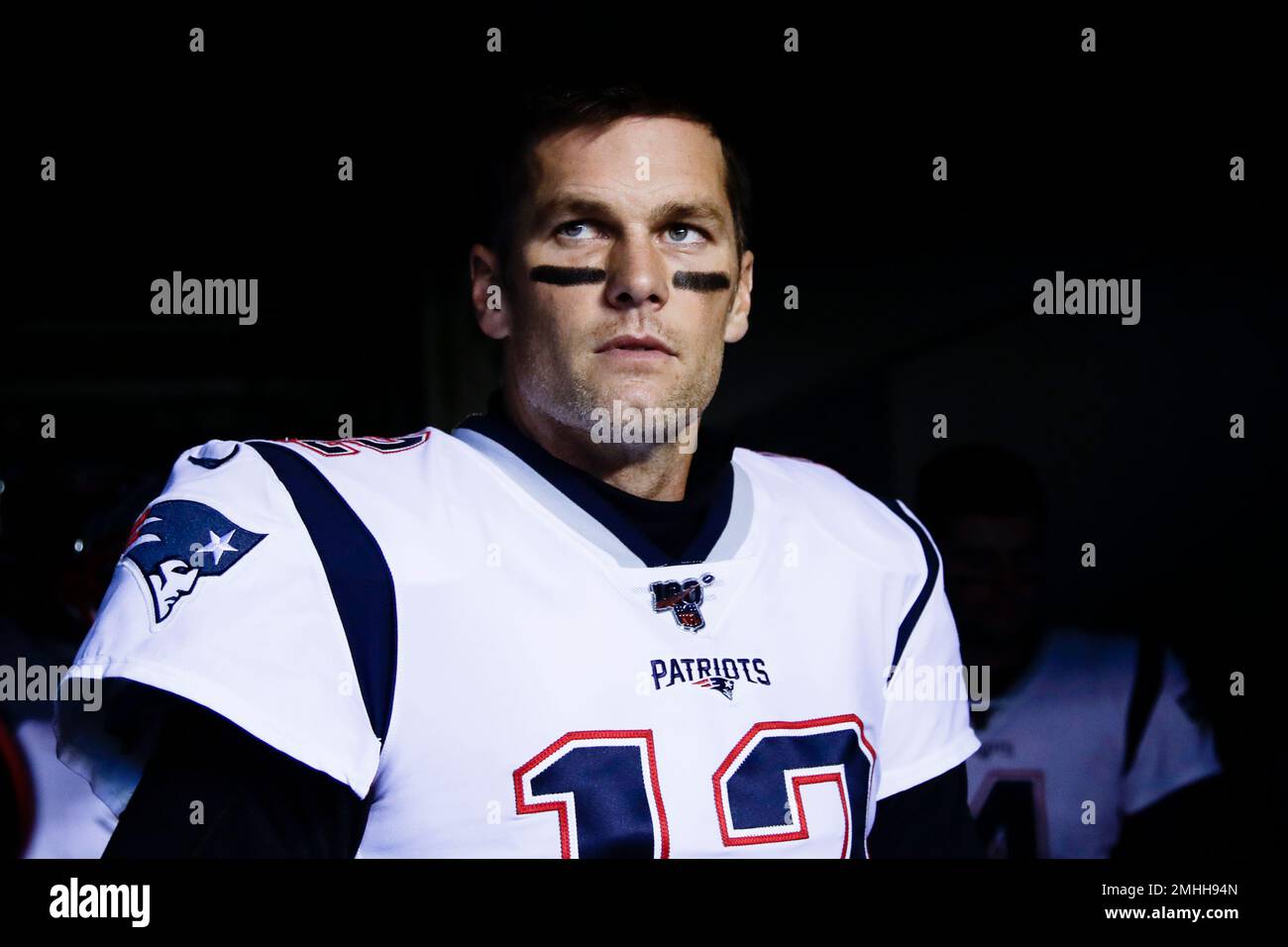 New England Patriots quarterback Tom Brady before an NFL football game ...