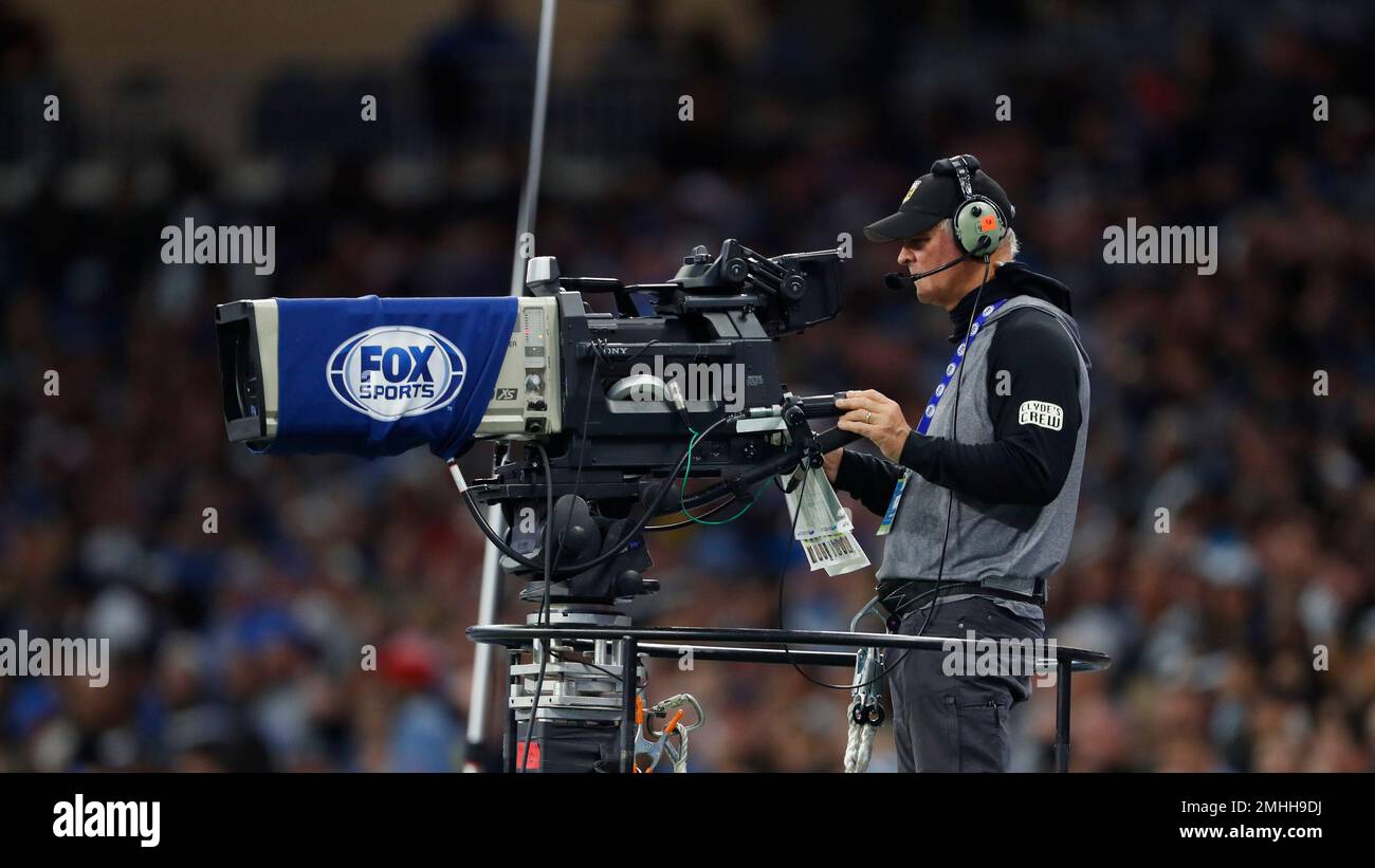 A Fox Sports cameraman is shown during an NFL football game between the ...