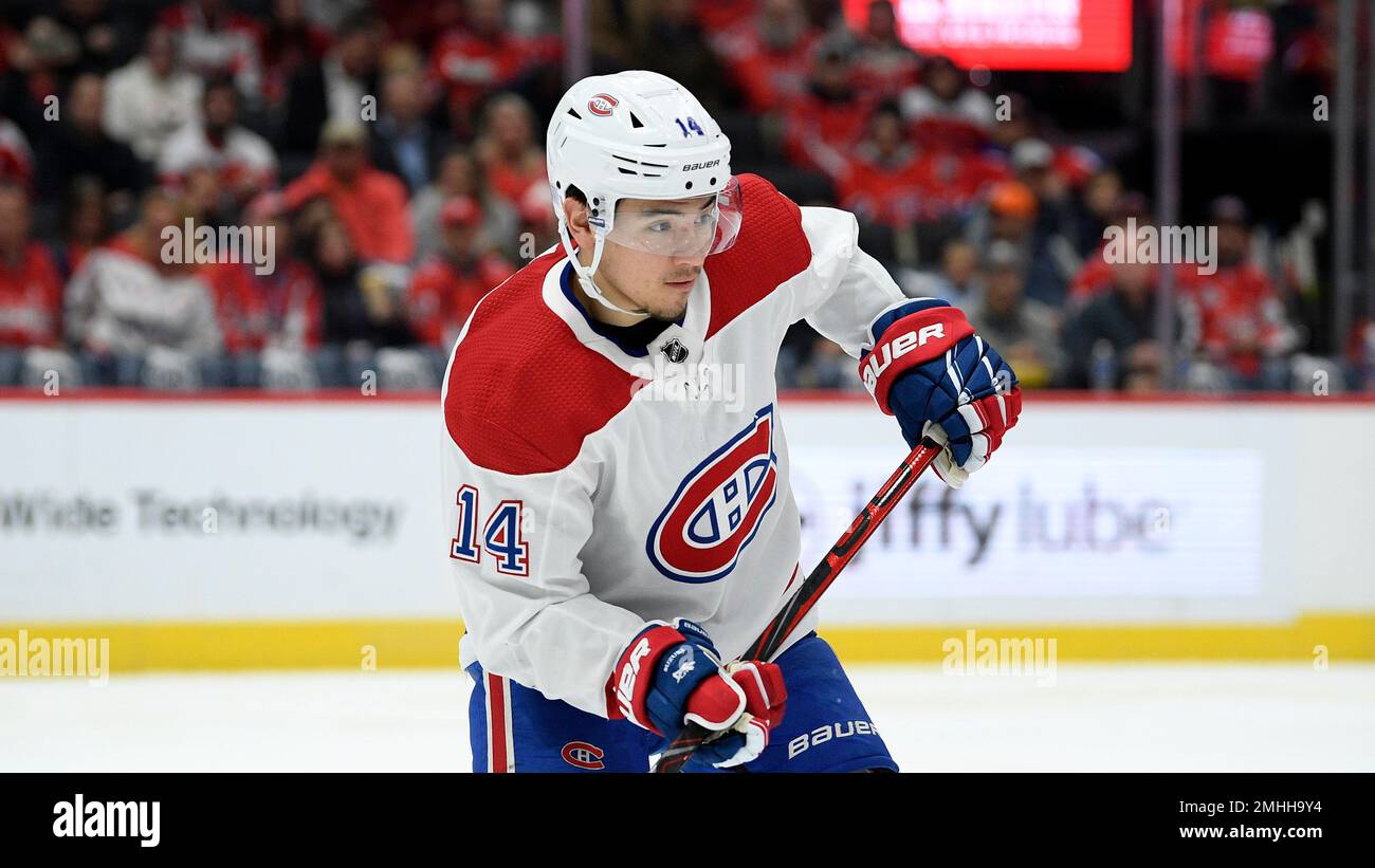 Montreal Canadiens center Nick Suzuki (14) skates during the first ...
