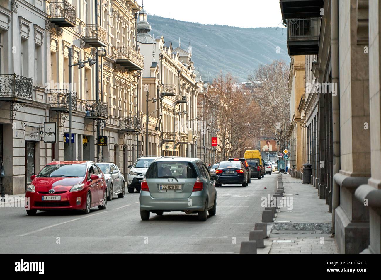 Streets of Tbilisi in early spring. Landscape of a city street. Tbilisi ...