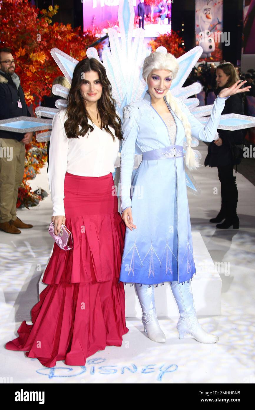 Voice actress Idina Menzel, left, poses for photographers alongside the ...