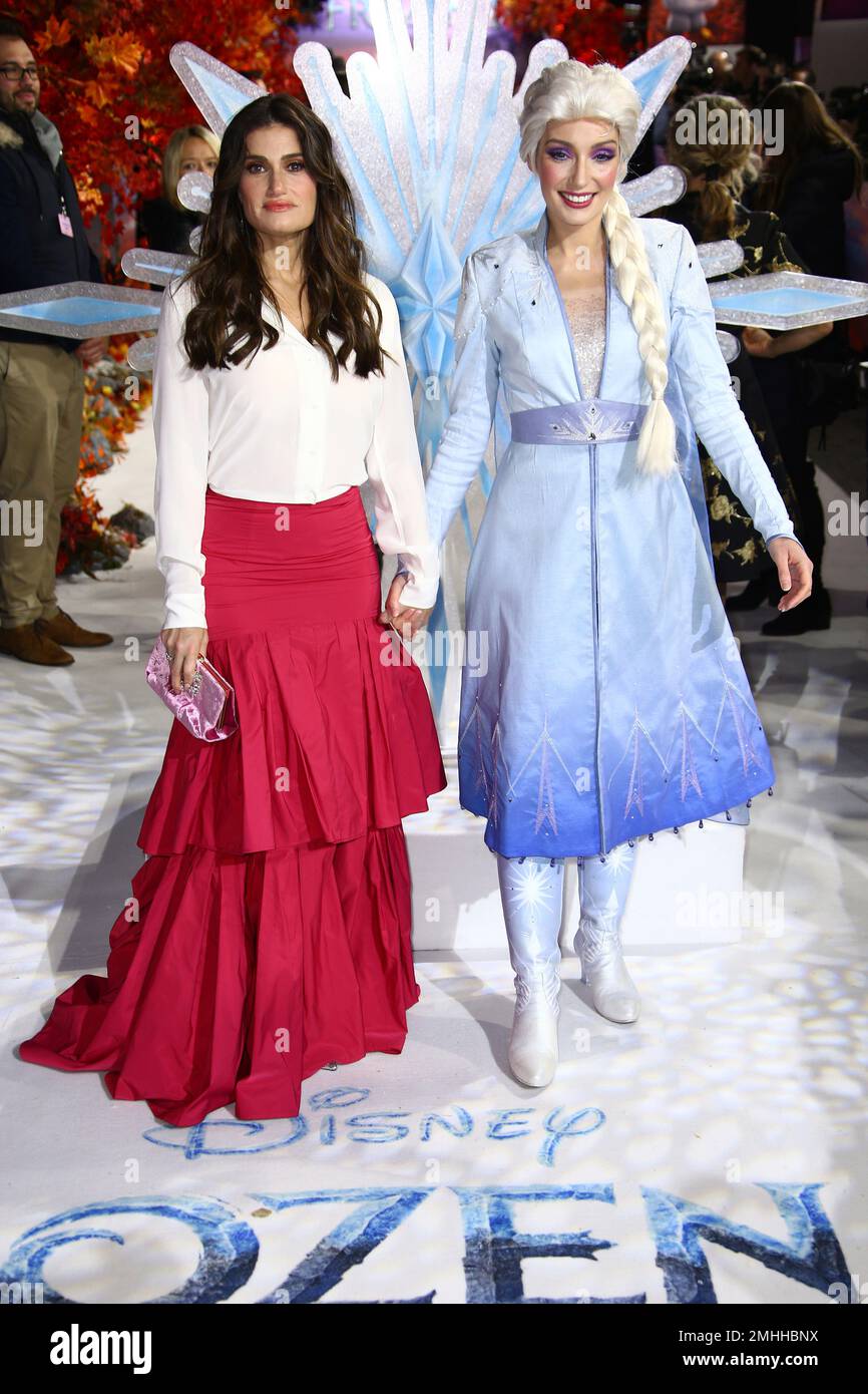 Voice actress Idina Menzel, left, poses for photographers alongside the ...