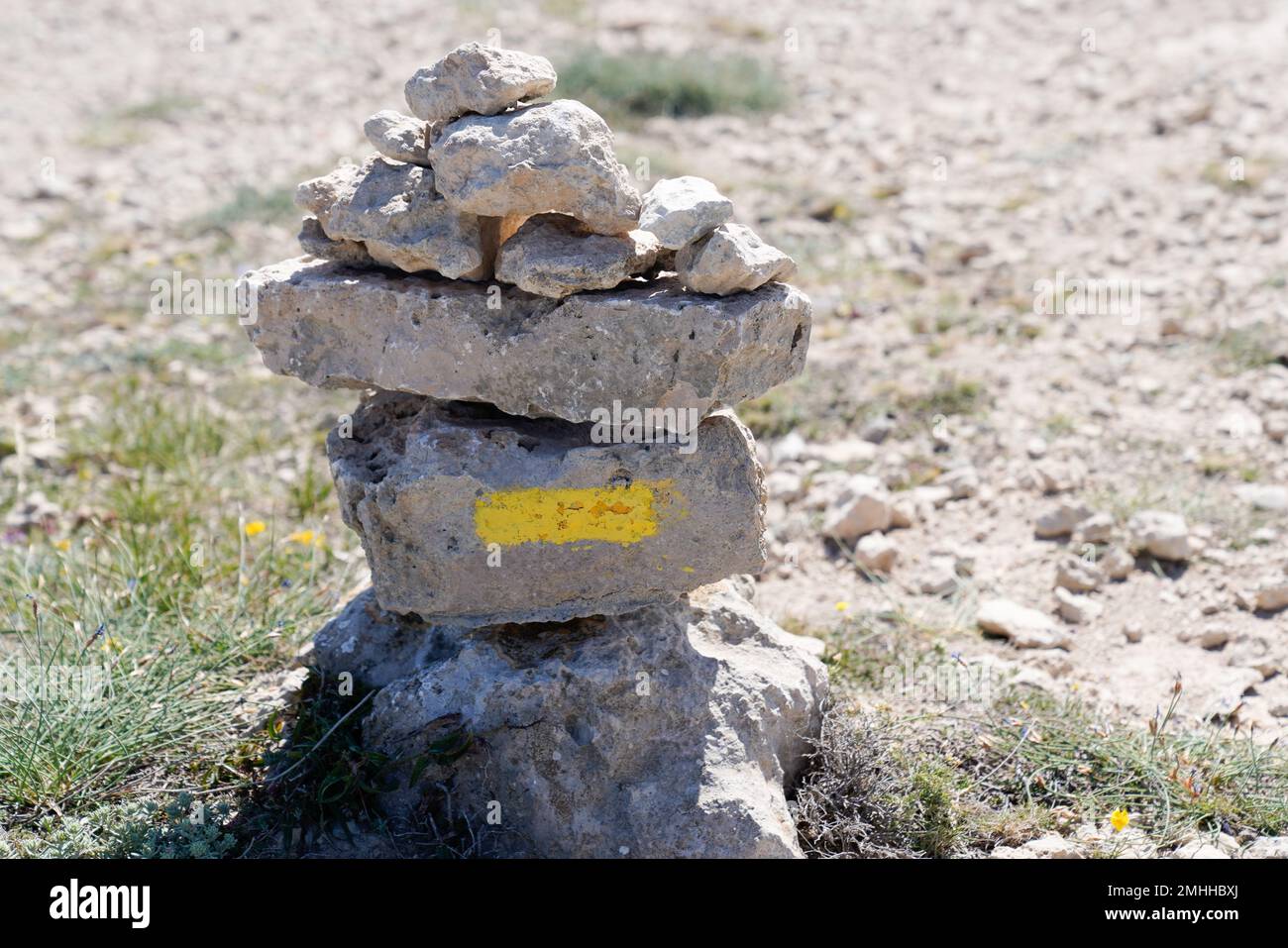 tour trail path sign on stones pyramid for hiking in mountain pathway ...