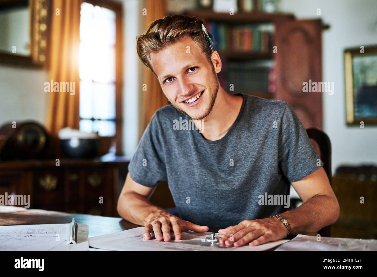 Young smiling man project hi-res stock photography and images - Alamy