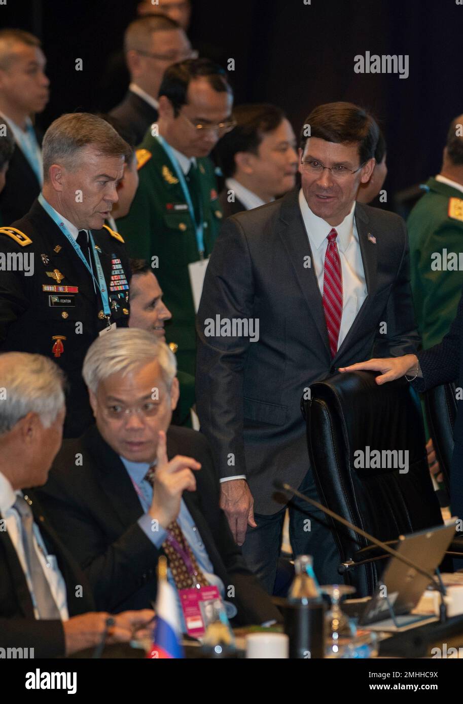 U.S. Defense Secretary Mark Esper, right, walks to participate in ASEAN ...