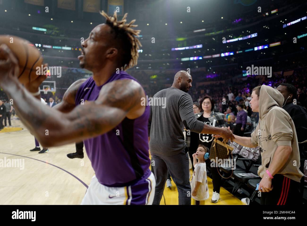 Former Los Angeles Lakers Kobe Bryant attends an NBA basketball game ...