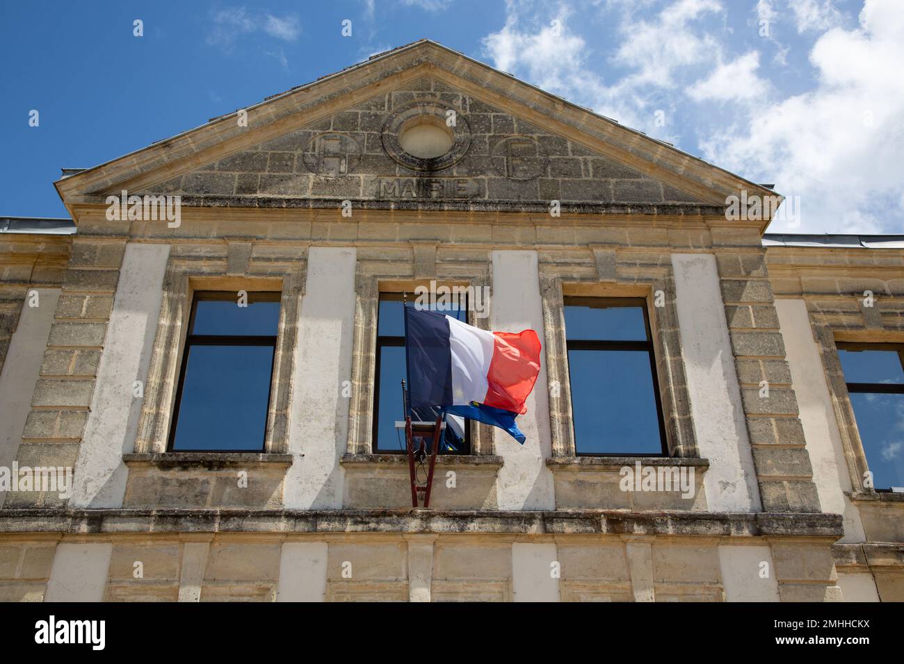 French tricolor and europa flag on france facade mairie text building ...