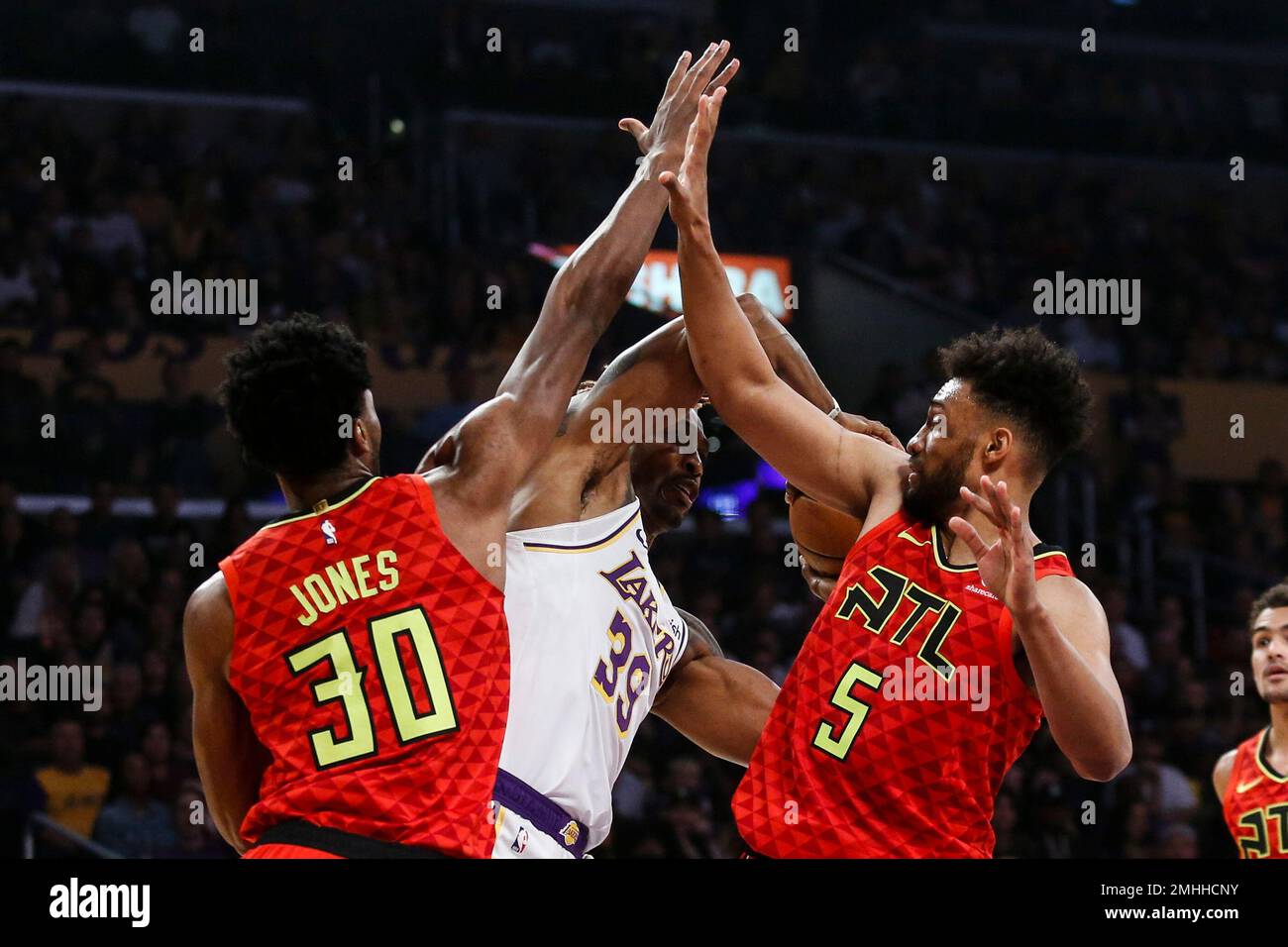 Los Angeles Lakers' Dwight Howard (39) is defended by Atlanta Hawks's ...