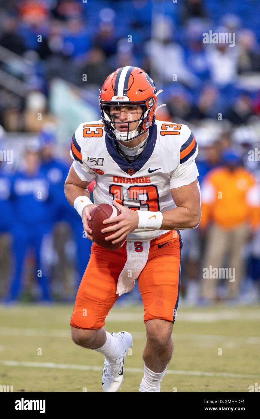 Syracuse's Tommy DeVito (13) carries the ball during an NCAA college ...