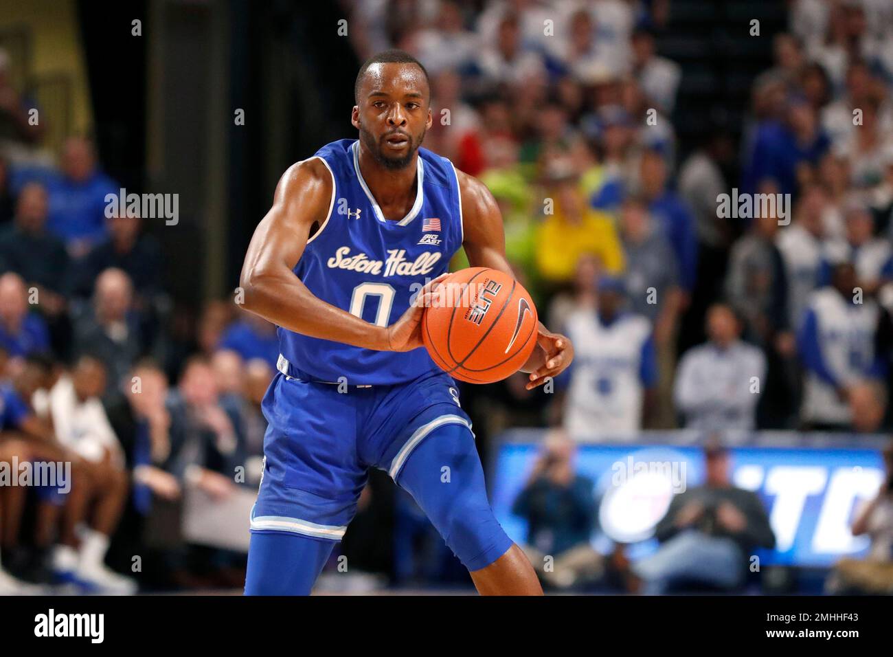 Seton Hall's Quincy McKnight (0) passes during the first half of an ...