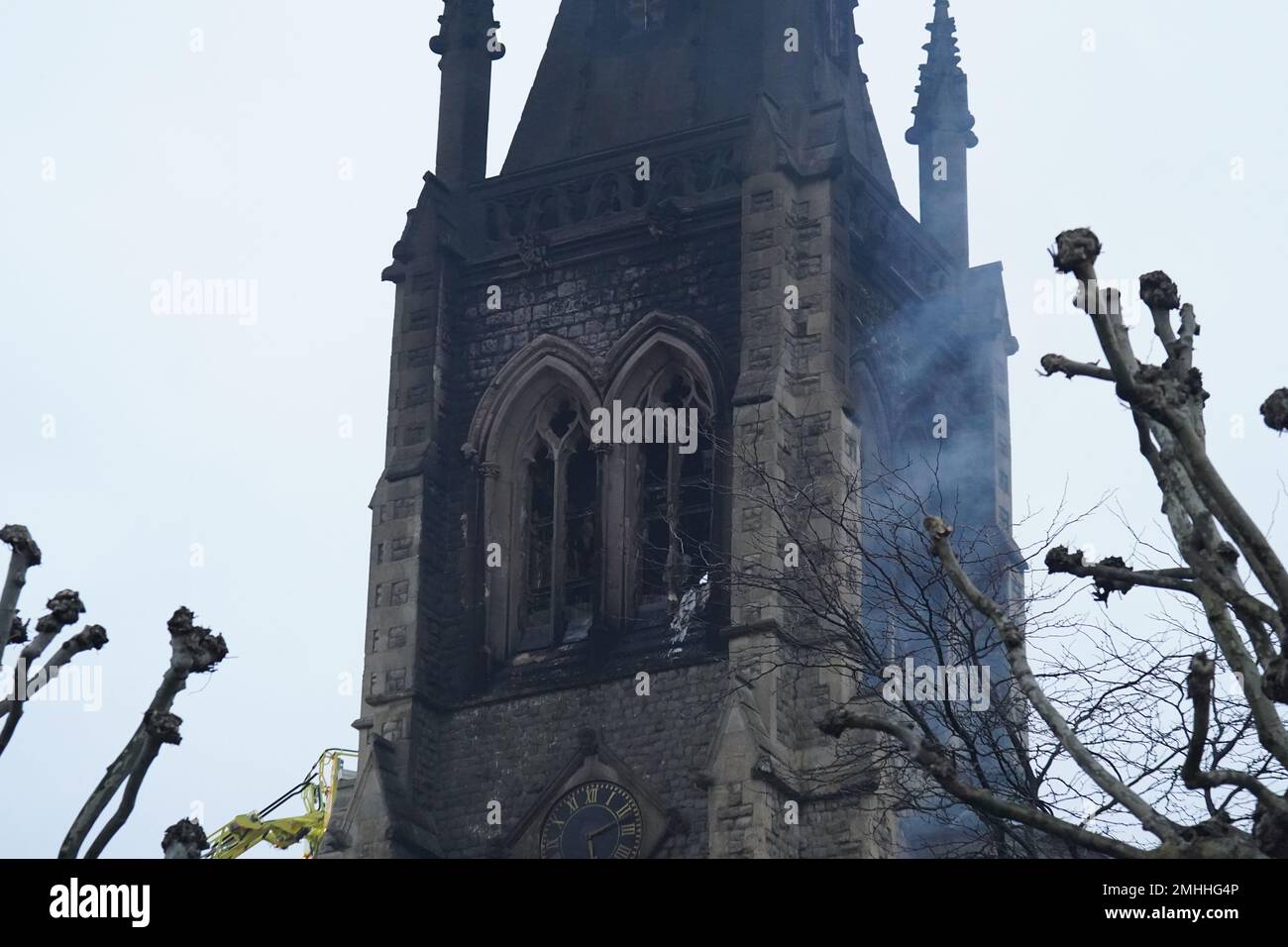Broken windows in the charred shell of St Mark's Church in Hamilton ...