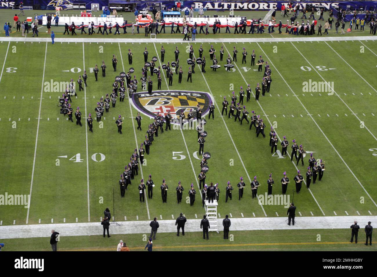The Baltimore Ravens marching band performs in the shape of the ...