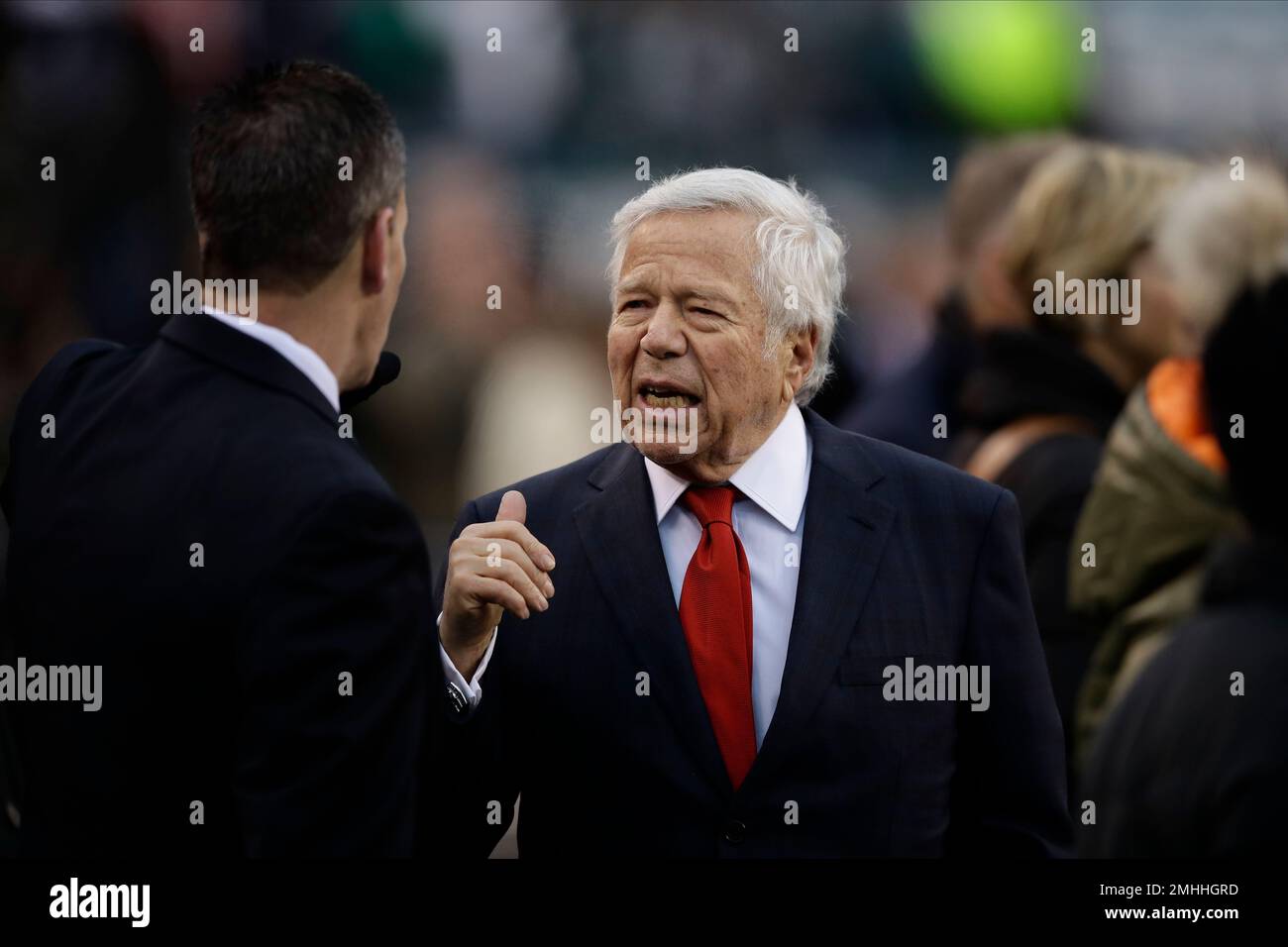 New England Patriots' Robert Kraft talks on the sidelines before an NFL ...