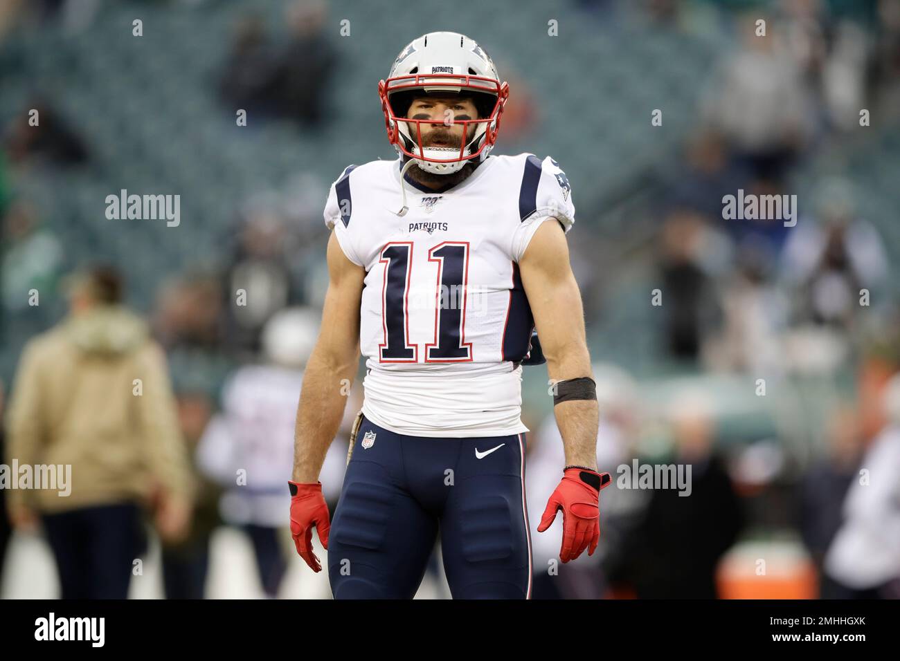New England Patriots' Julian Edelman warms up before an NFL football ...
