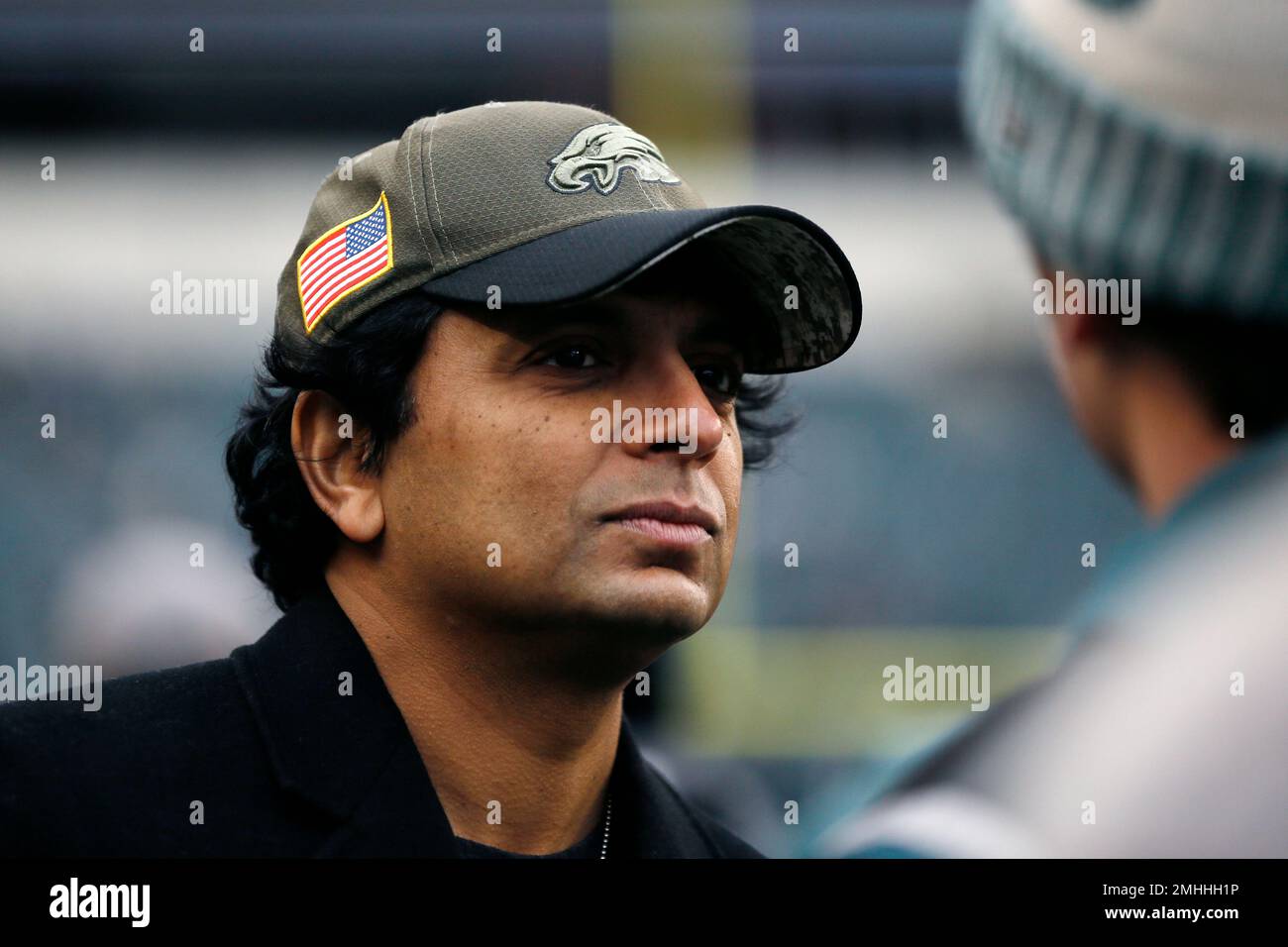 M. Night Shyamalan is seen before an NFL football game between the ...