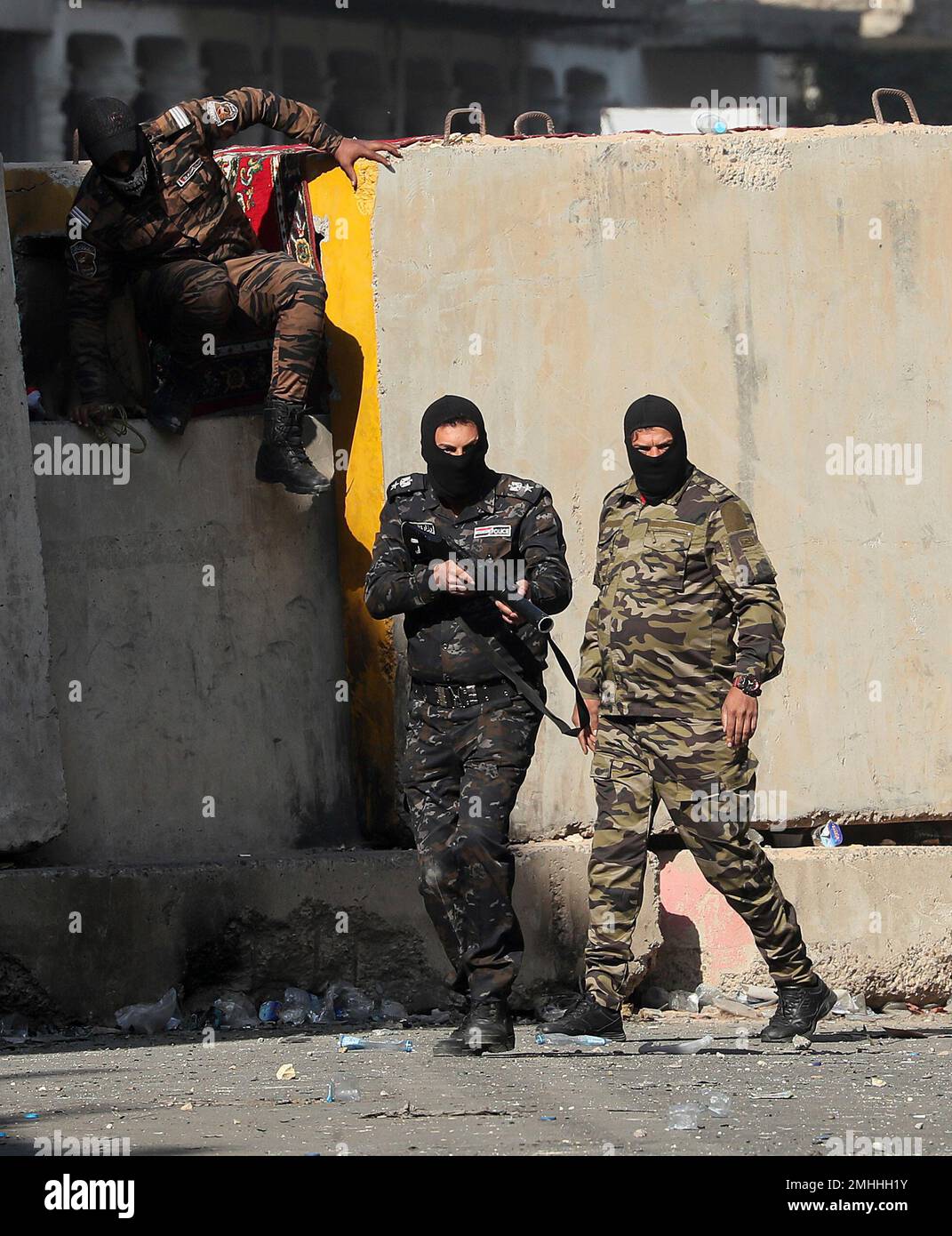 Riot police try to disperse anti-government protesters during ongoing ...