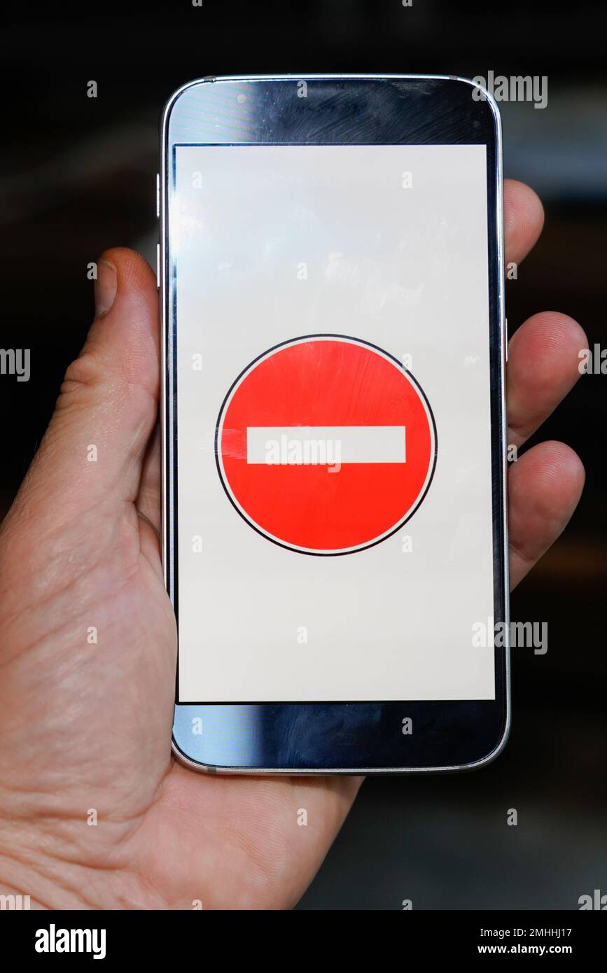 Access denied sign on smartphone screen in man hand Stock Photo - Alamy