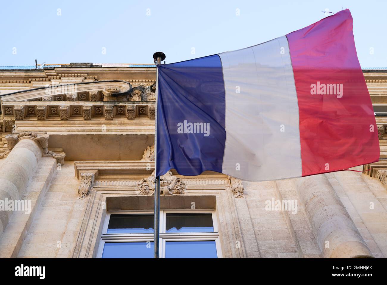 french flag tricolor red white blue sign on entrance city hall of town ...