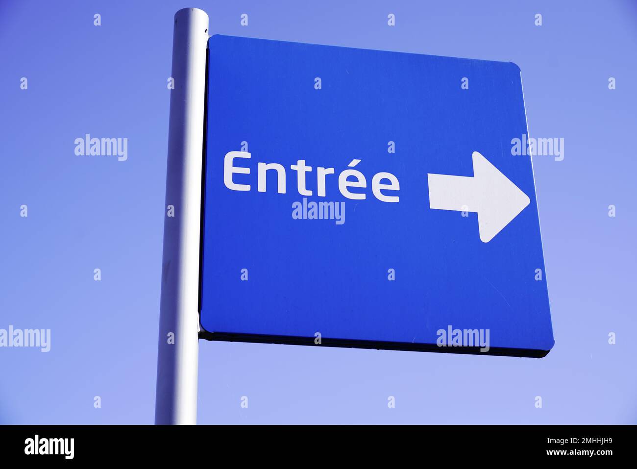 Modern panel blue sign with entrance text and white arrow Stock Photo ...