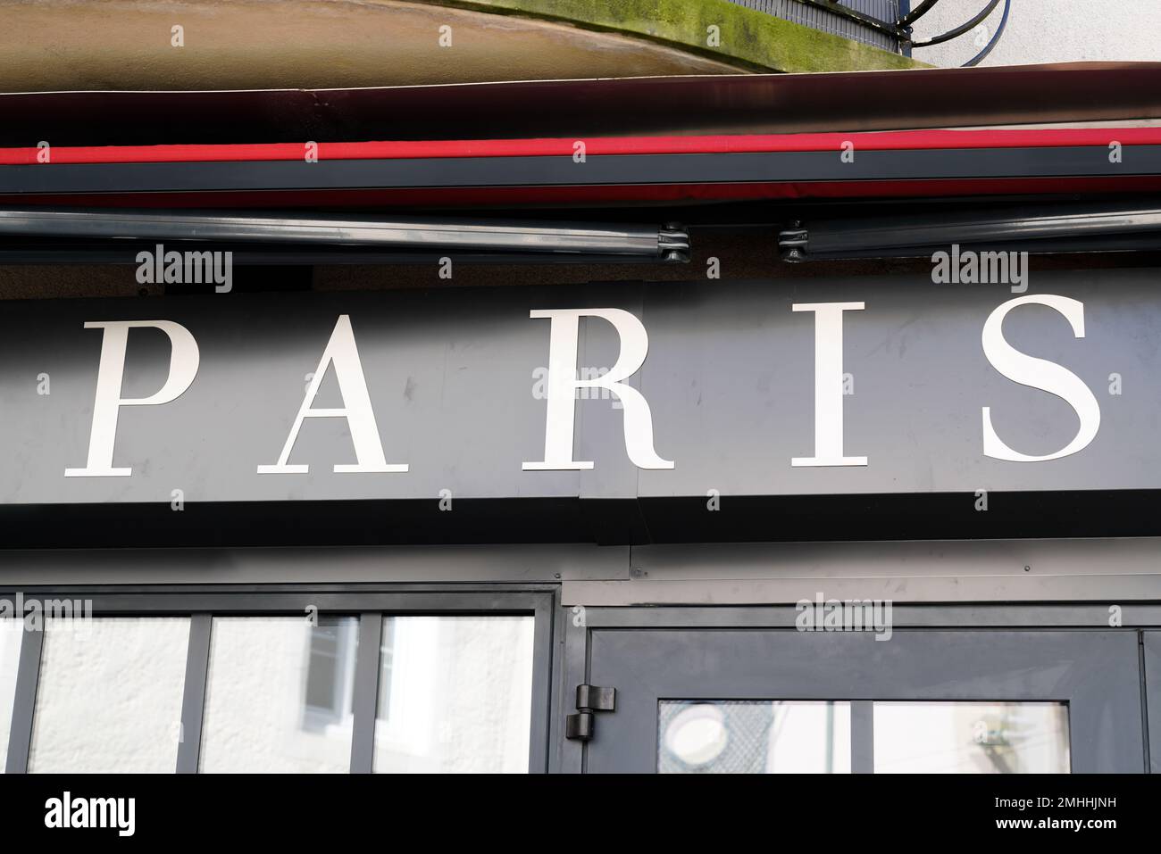 paris french text on the facade of a store in the capital of the ...