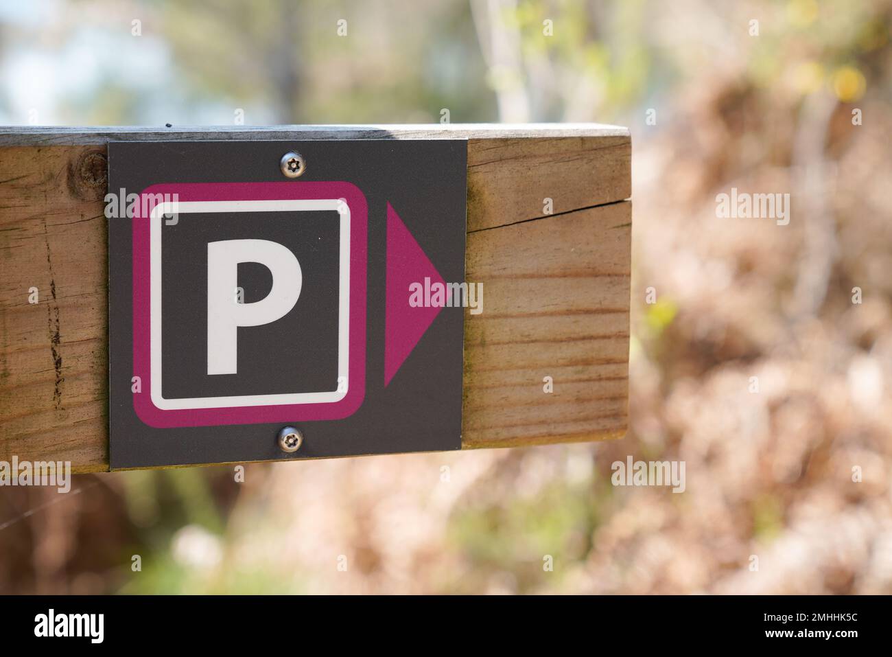 wooden car park directional sign with an arrow to parking vehicle Stock ...