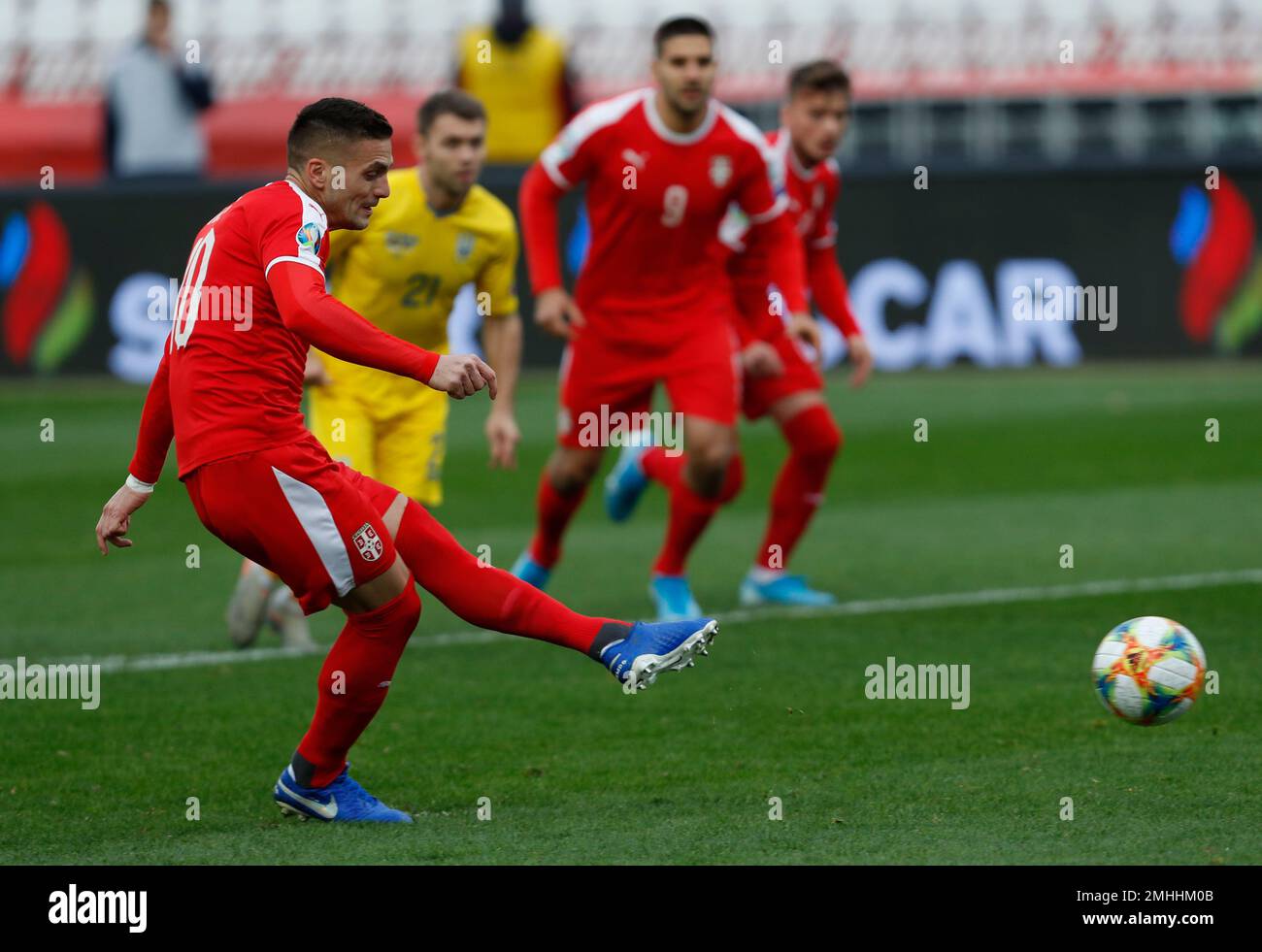 Serbia's Dusan Tadic scores on a penalty kick during the Euro 2020 ...