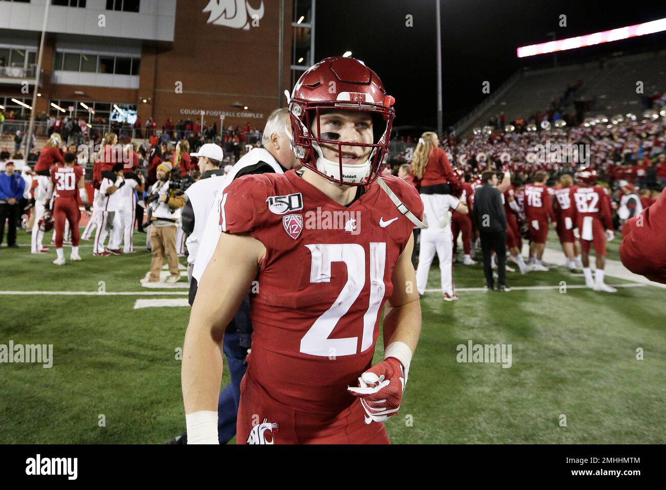 Washington State running back Max Borghi (21) walks on the field after ...