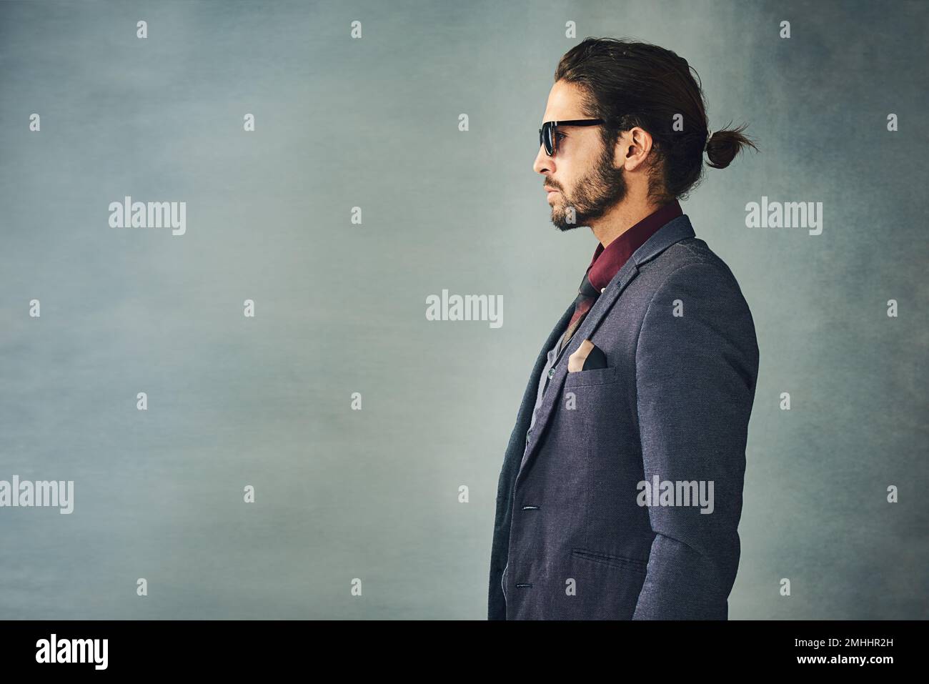 Fashion is his thang. Studio profile shot of a stylishly dressed ...