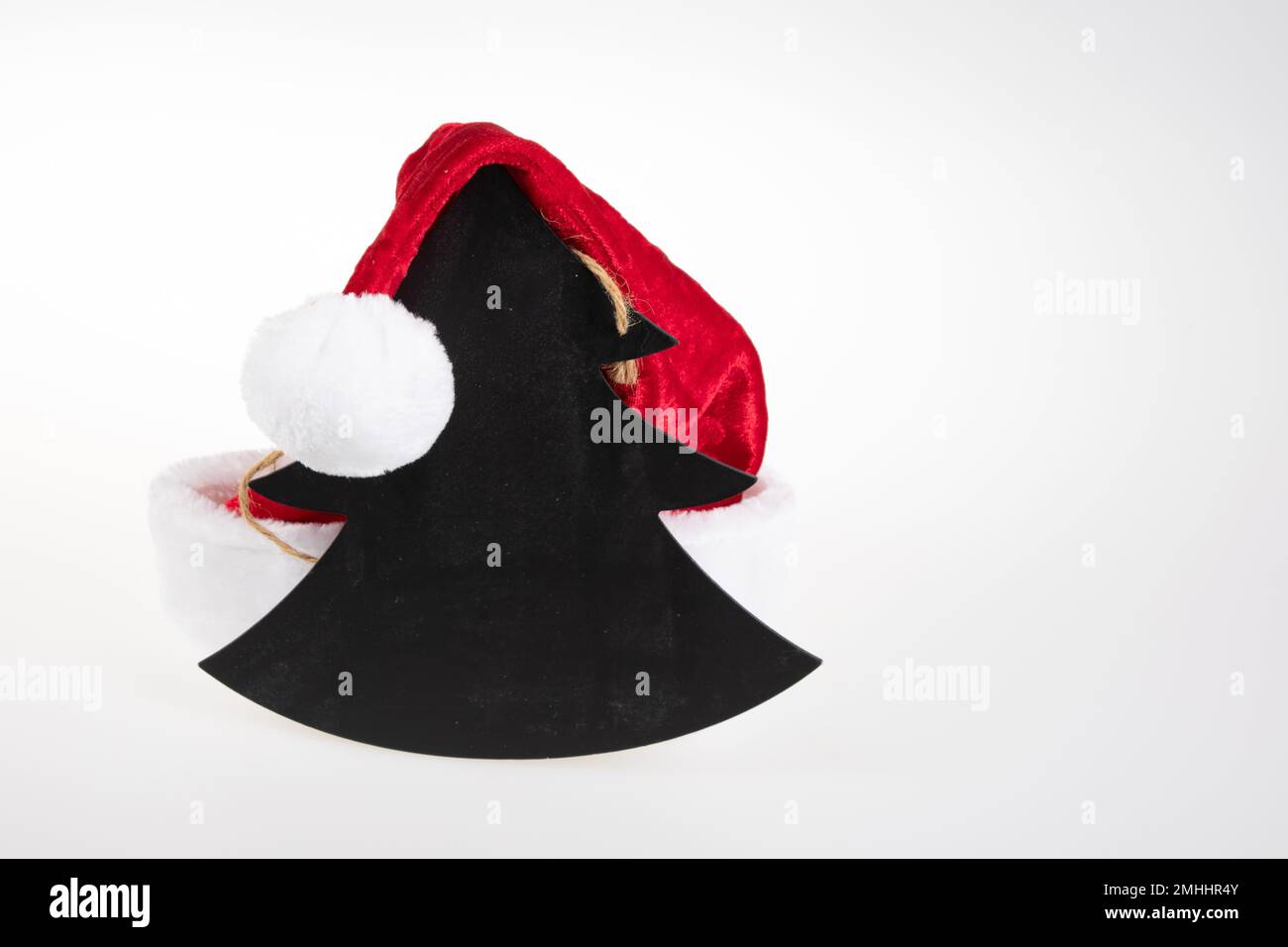 Christmas tree chalkboard slate mockup and santa claus hat on white ...