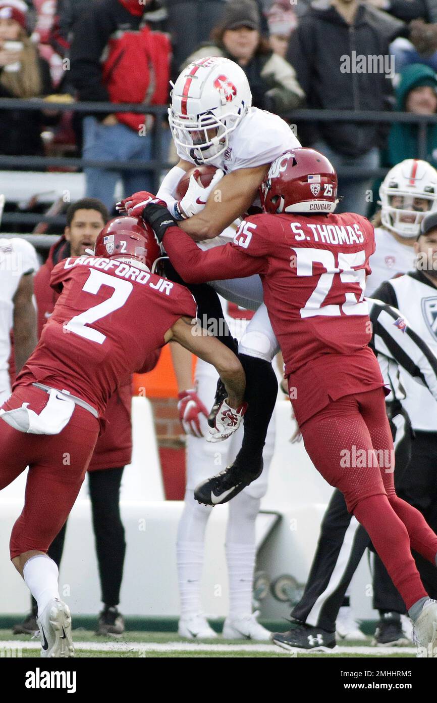 Washington State cornerback Derrick Langford, left, and defensive back ...