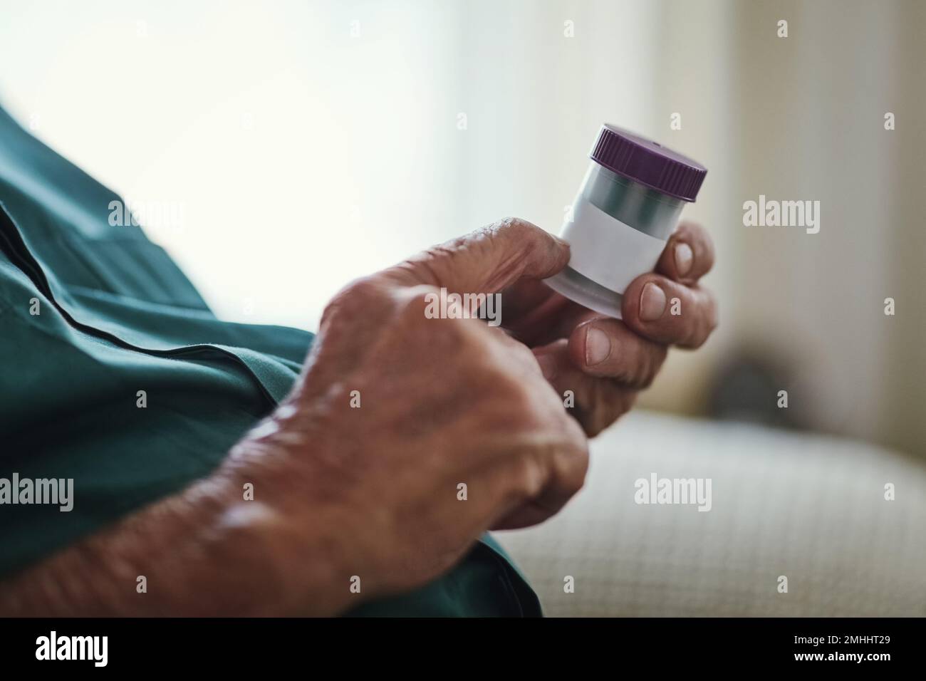 I often forget my regular dose...a senior man about to take his ...