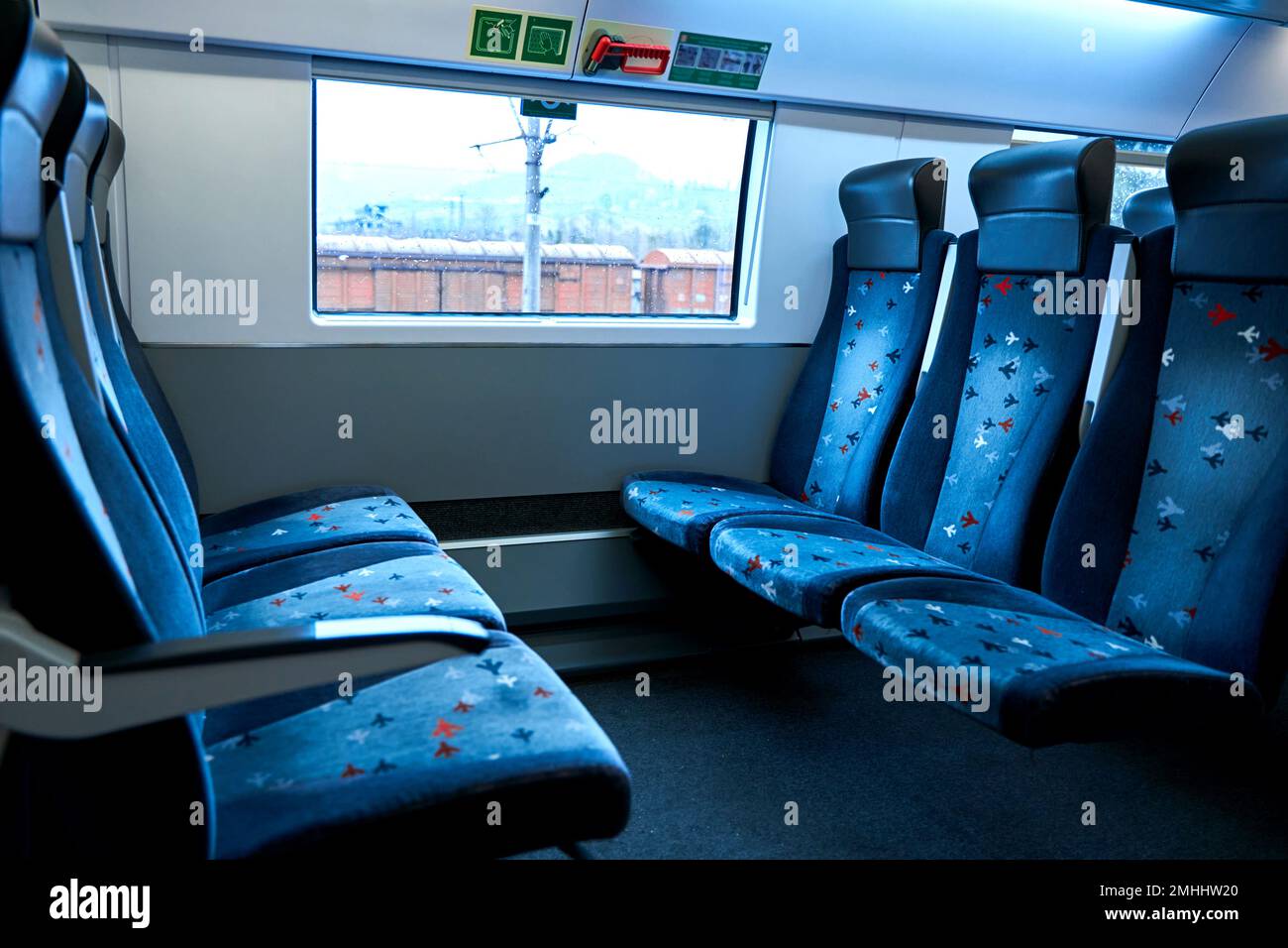 The deserted interior of a high-speed train. Rows of empty seats Stock ...