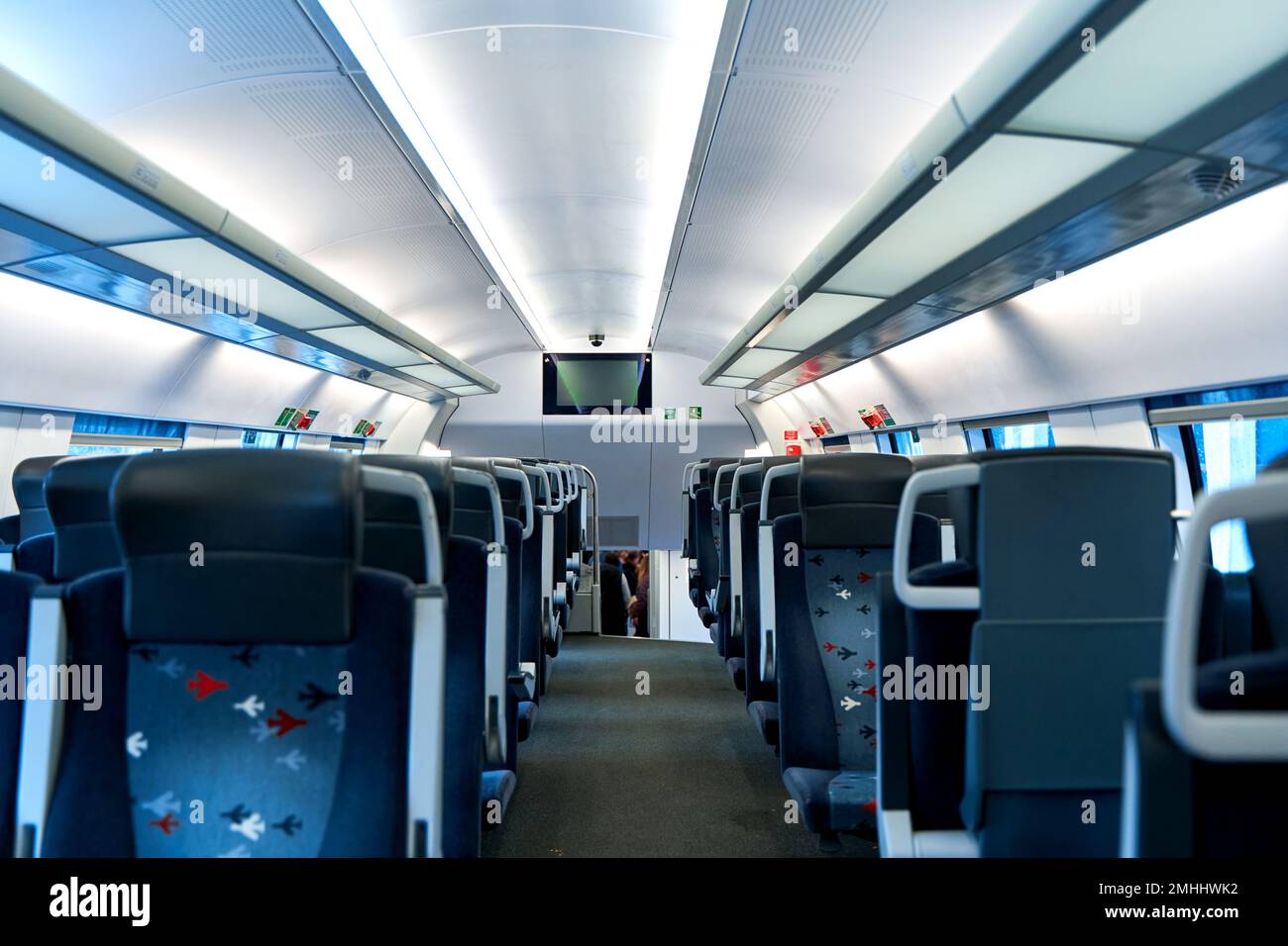 The deserted interior of a high-speed train. Rows of empty seats Stock ...
