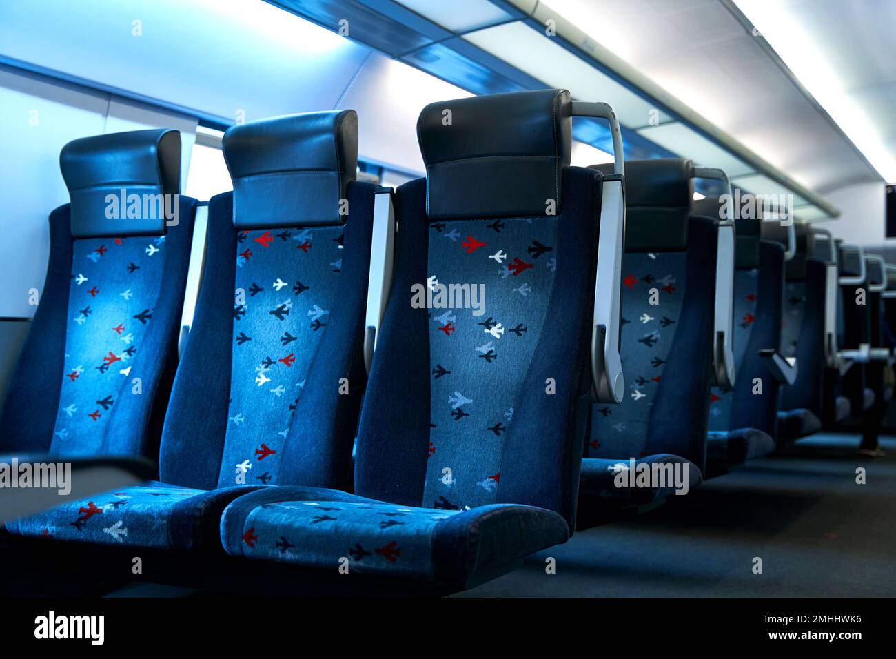 The deserted interior of a high-speed train. Rows of empty seats Stock ...