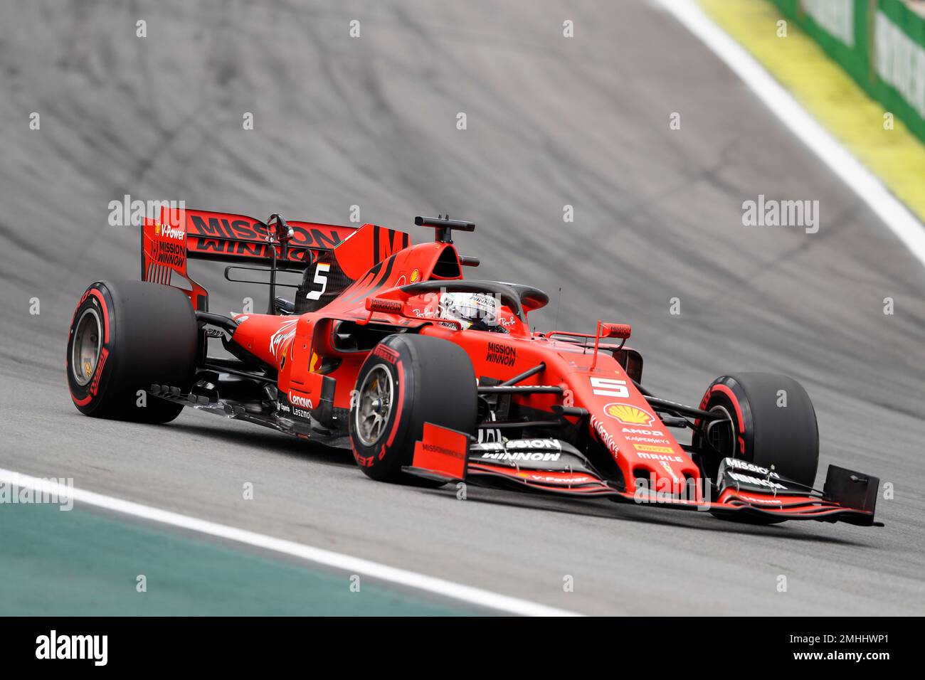 Ferrari driver Sebastian Vettel, of Germany, steers his car during the ...