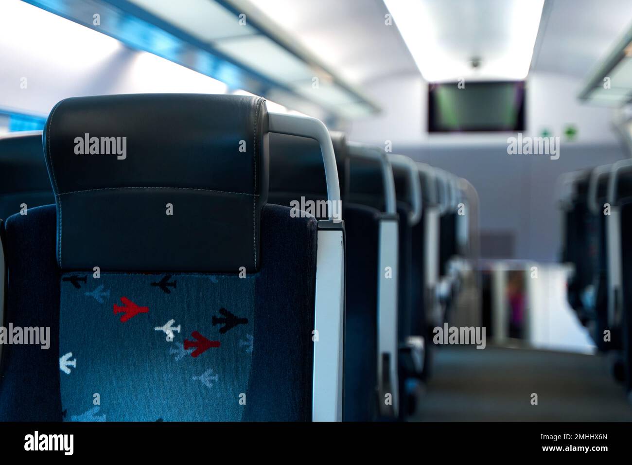 The deserted interior of a high-speed train. Rows of empty seats Stock ...