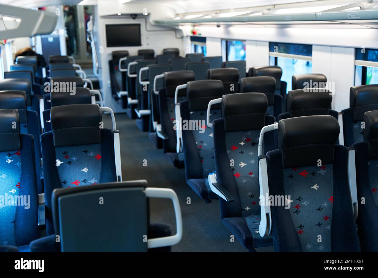 The deserted interior of a high-speed train. Rows of empty seats Stock ...